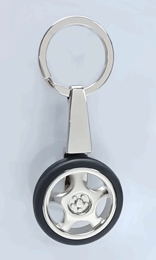 MI-1202 SPINNING TIRE KEY CHAIN – Minya Collections